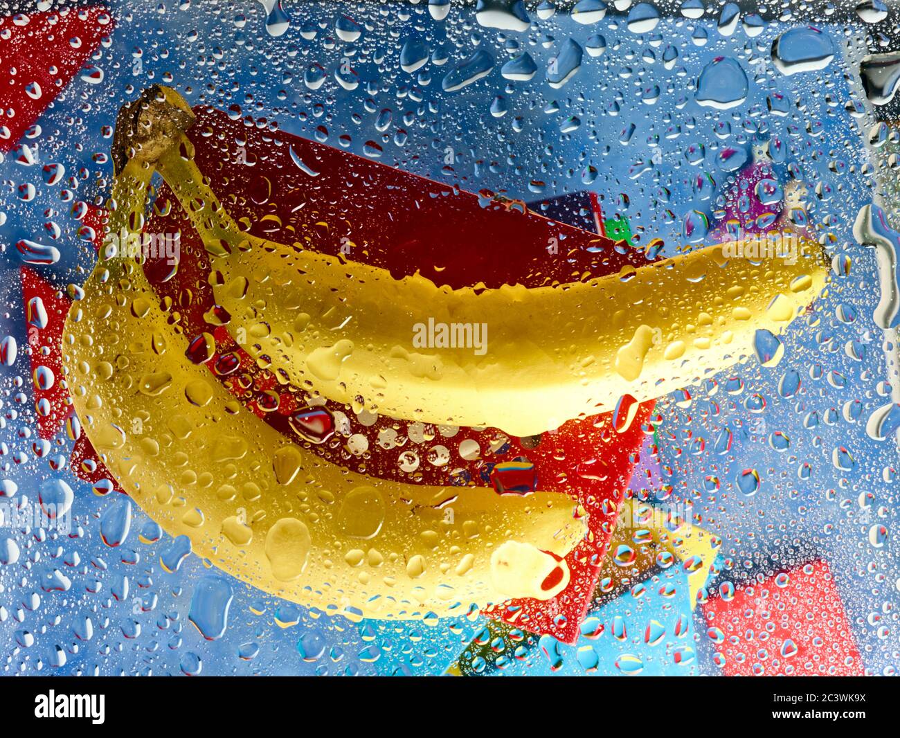 Ripe bananas and water droplets close-up semi-abstract natural ...