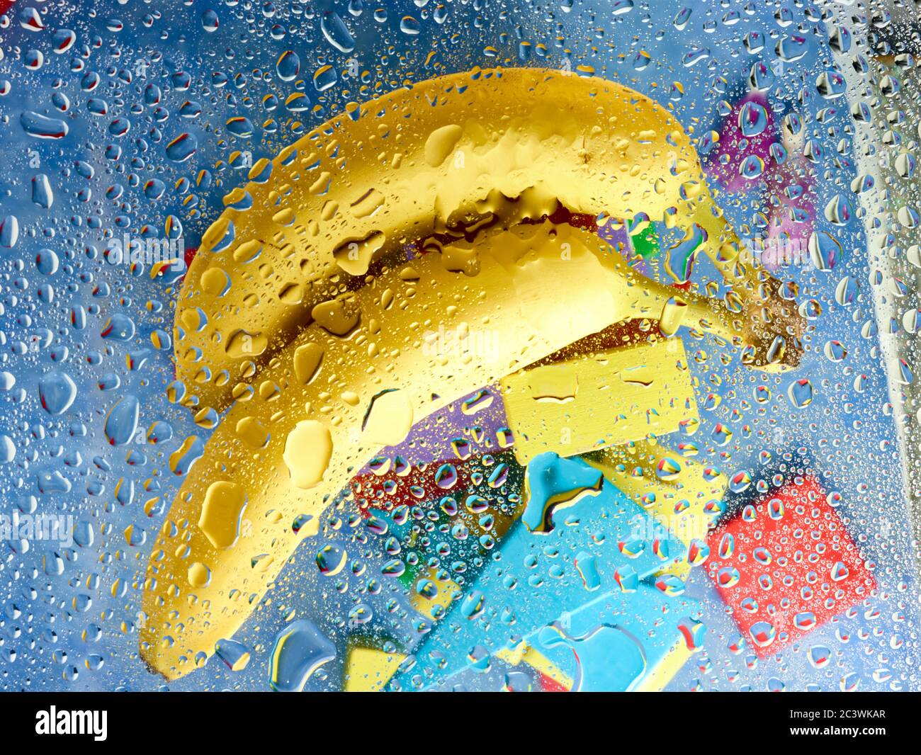 Ripe bananas and water droplets close-up semi-abstract natural ...