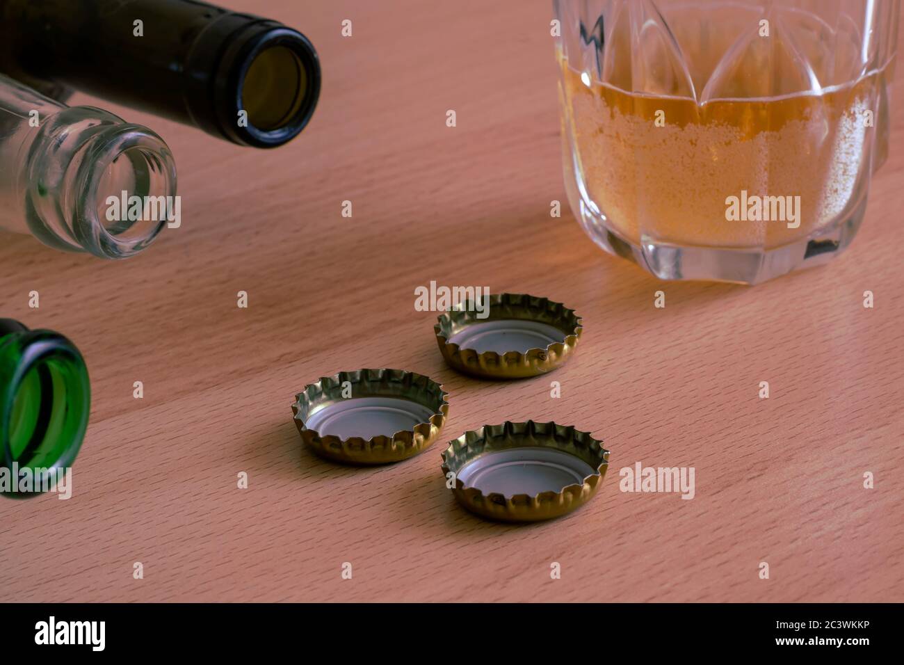 Alcoholism social problem, background. Beer glass with unfinished beer ...