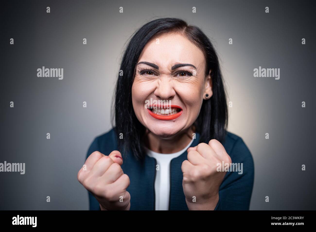 Angry brunette woman hi-res stock photography and images - Alamy