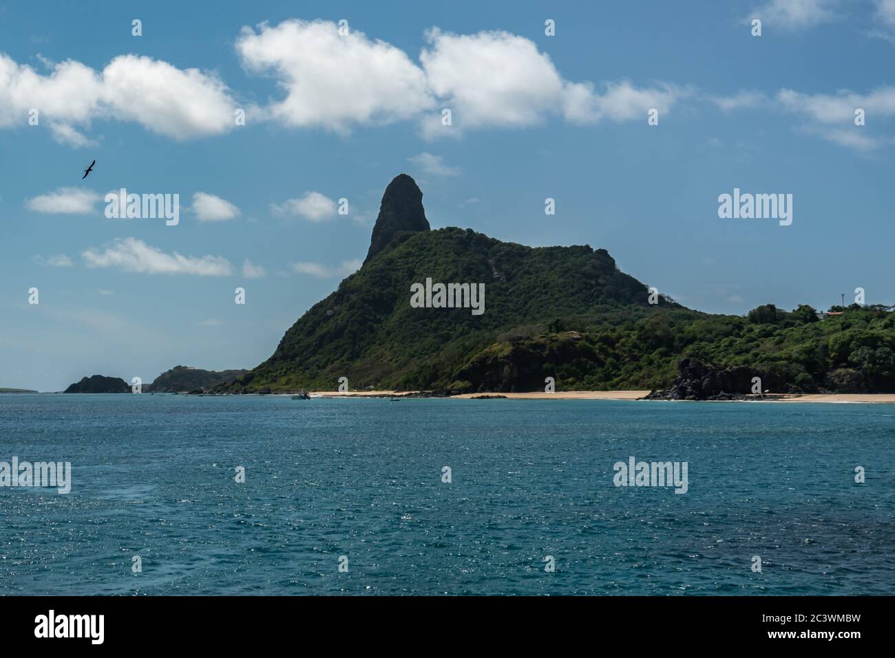 Beautiful view of Morro do Pico background from the sea at Fernando de ...
