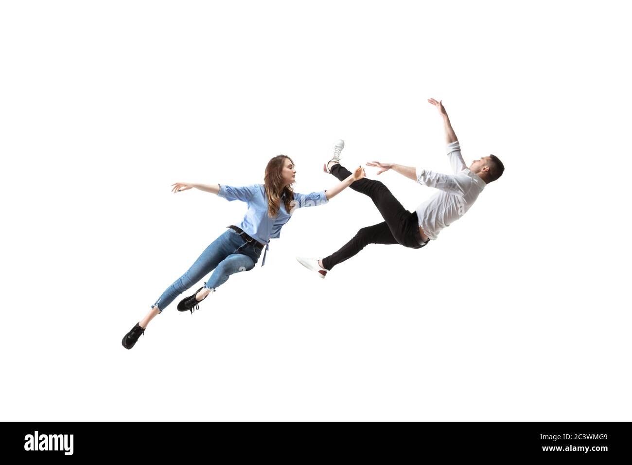 Mid-air beauty cought in moment. Full length shot of attractive young ...