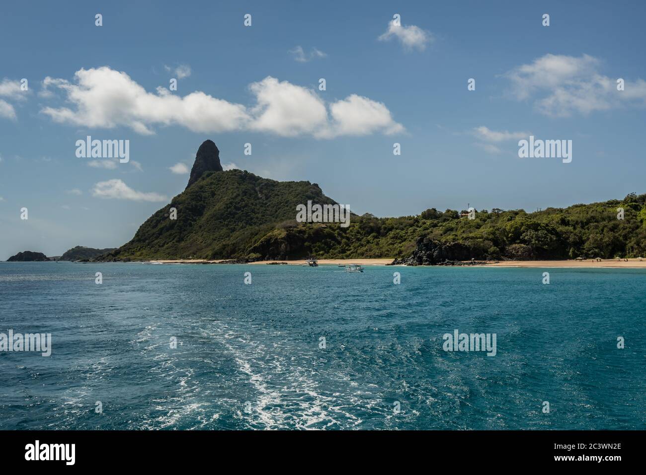 Beautiful view of Morro do Pico background from the sea at Fernando de ...