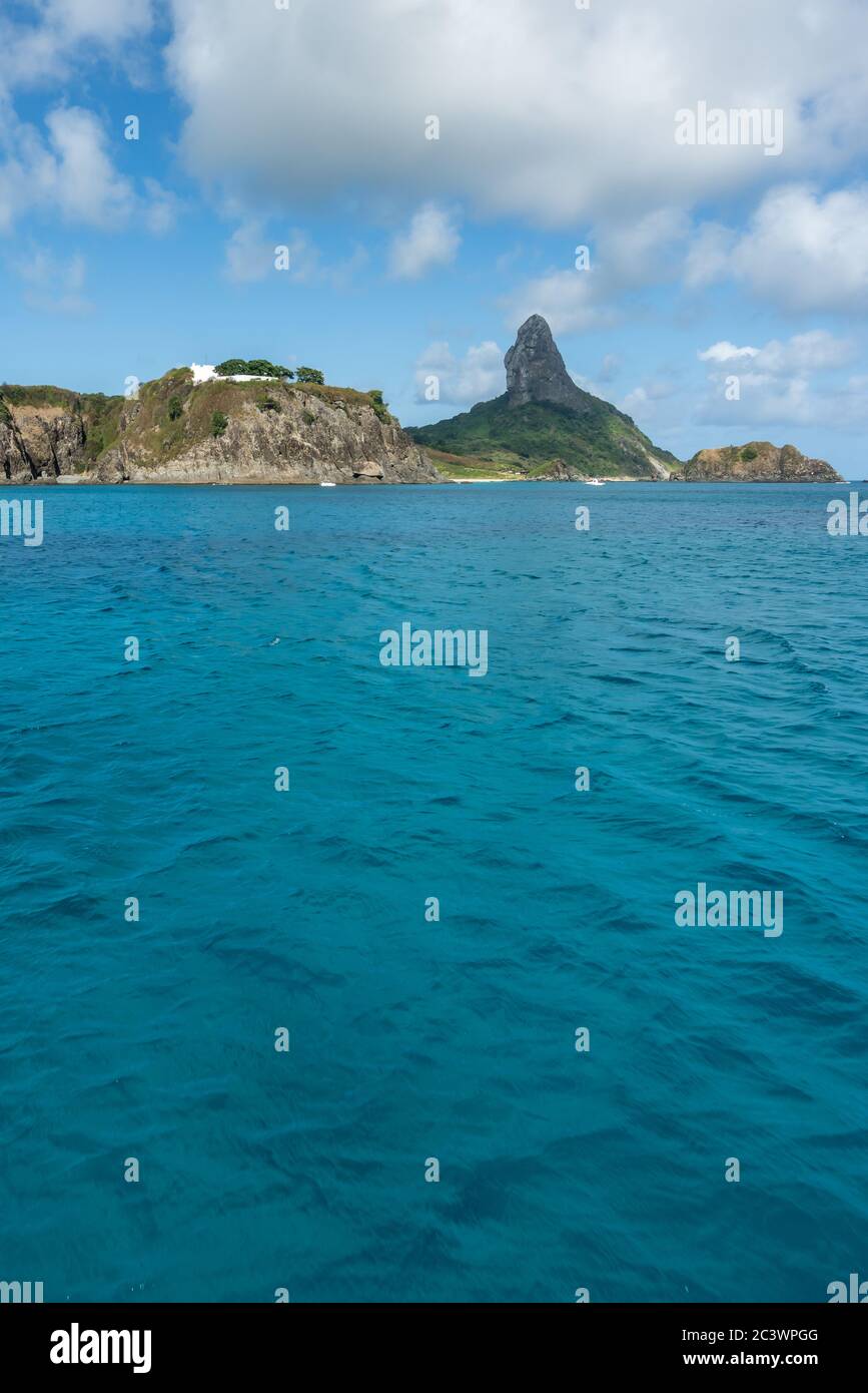 Beautiful view of Morro do Pico from the sea at Fernando de Noronha, a ...