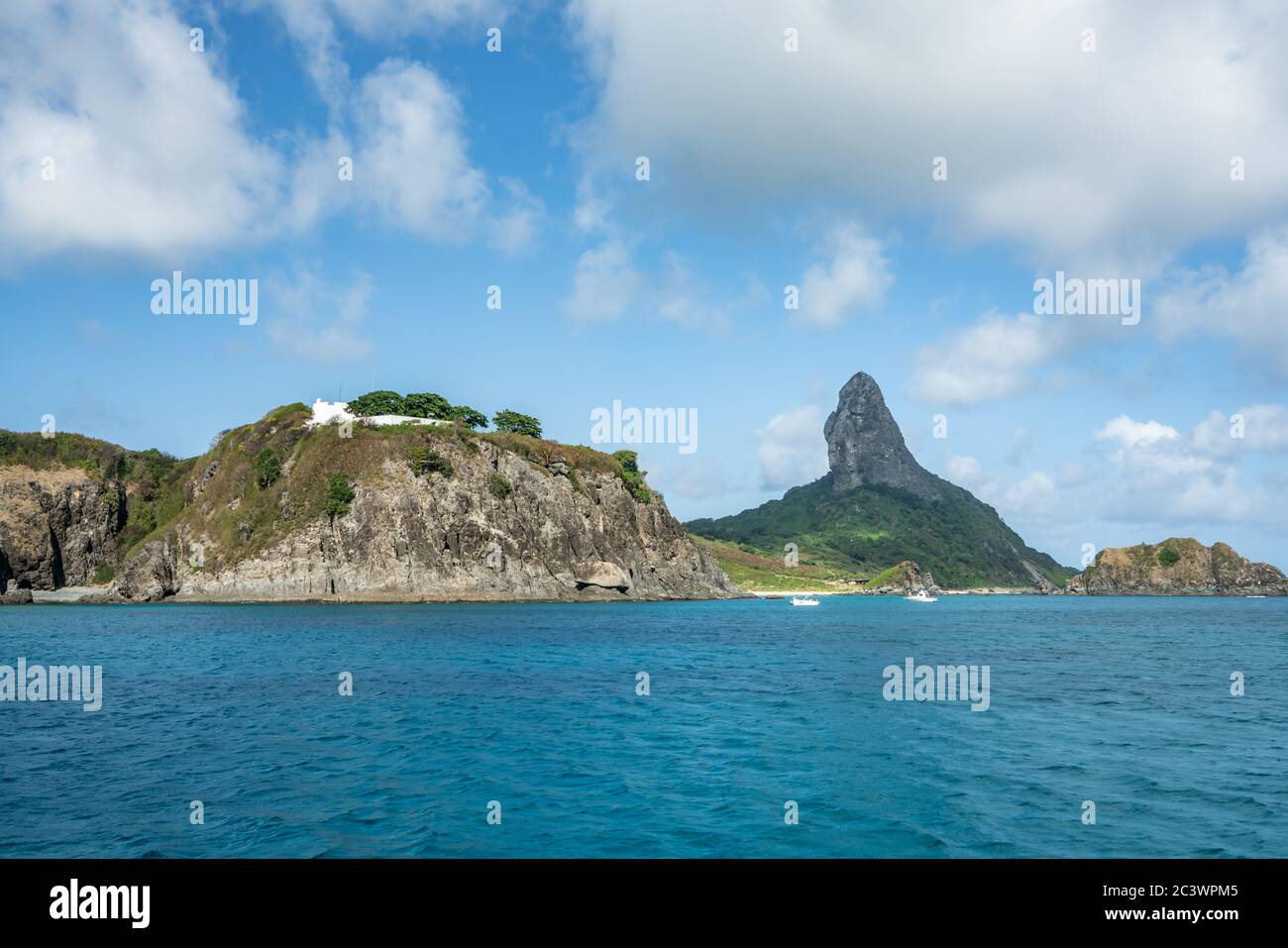 Beautiful view of Morro do Pico from the sea at Fernando de Noronha, a ...