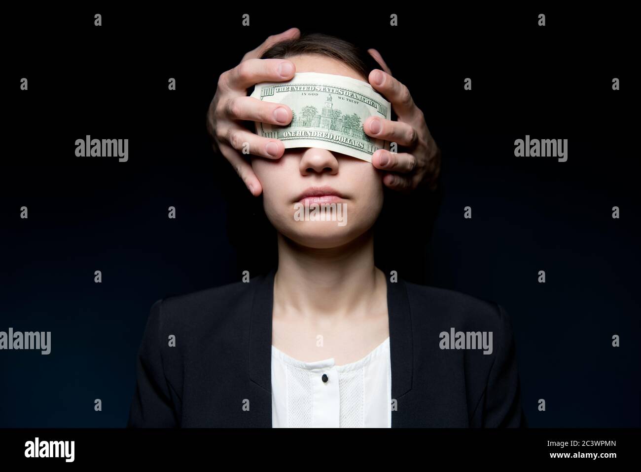 Business woman blinded by money. Dollars close her eyes Stock Photo - Alamy