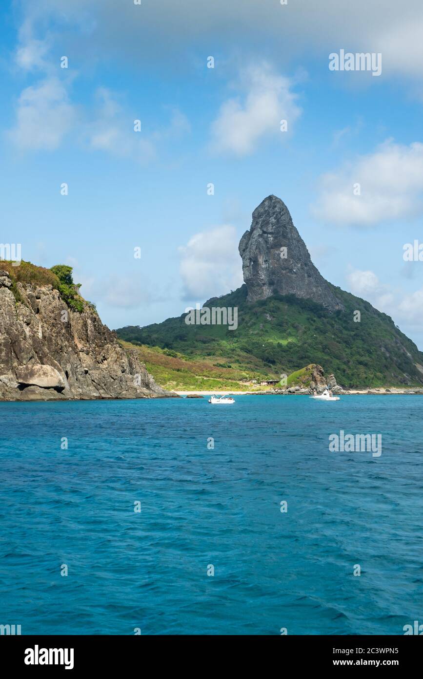 Beautiful view of Morro do Pico from the sea at Fernando de Noronha, a ...