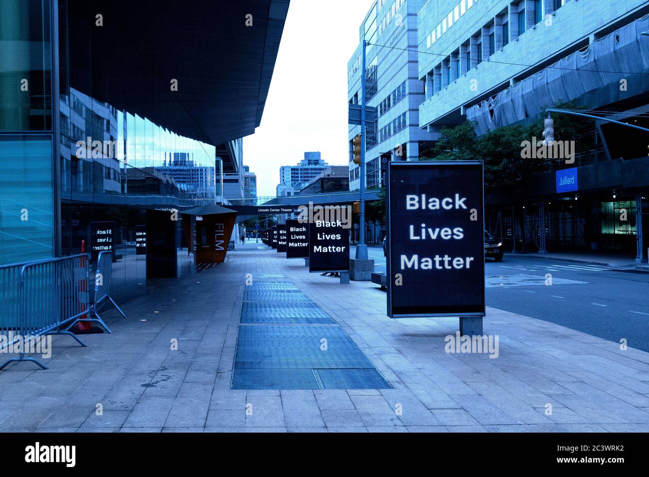 Multiple electronic signs in perspective angle next toLincoln Center in ...