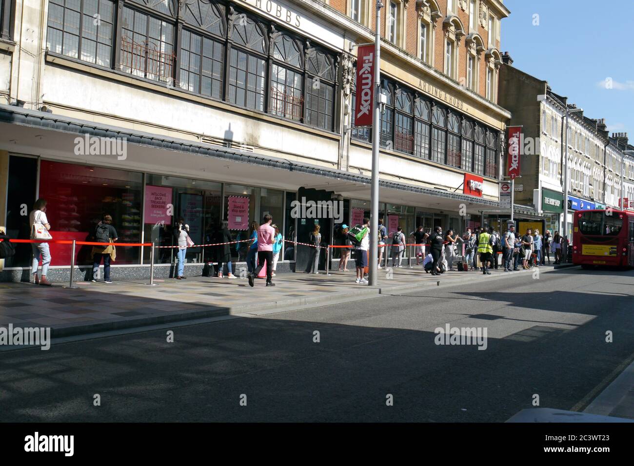 London, UK. 22nd June, 2020. Long queues at TK Maxx on Monday afternoon ...