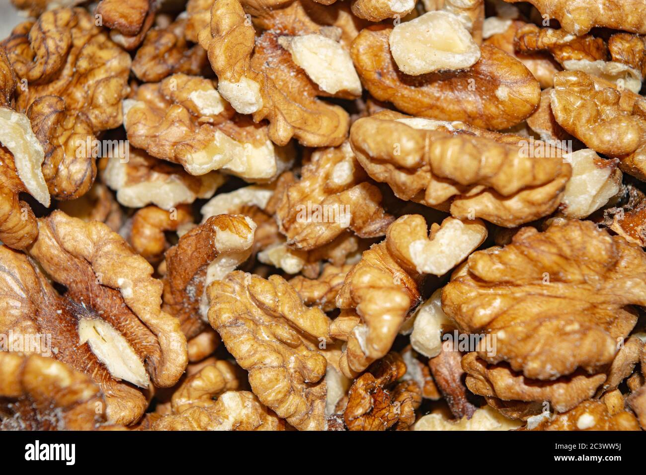 Peeled walnuts close-up. Surface texture. Healthy diet Stock Photo - Alamy