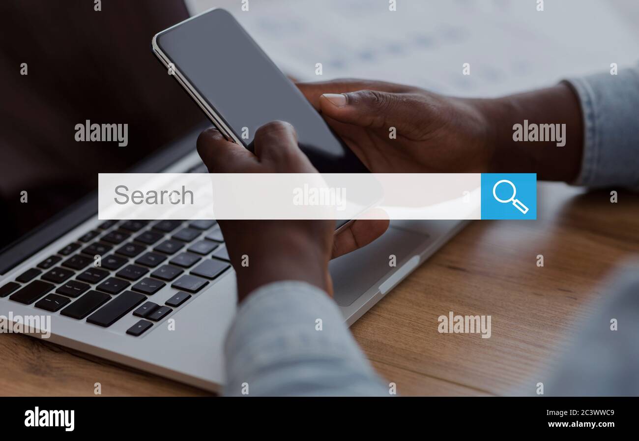 Mobile search african guy browsing hi-res stock photography and images ...