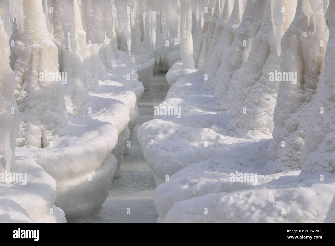 Giant sea icicles. Ice figures formed in the Black Sea in winter. Lumps ...