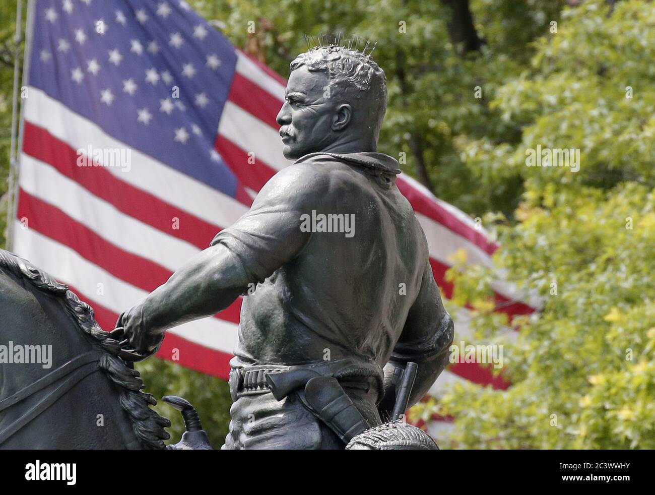 Police barricades surround the area around a bronze statue of former ...
