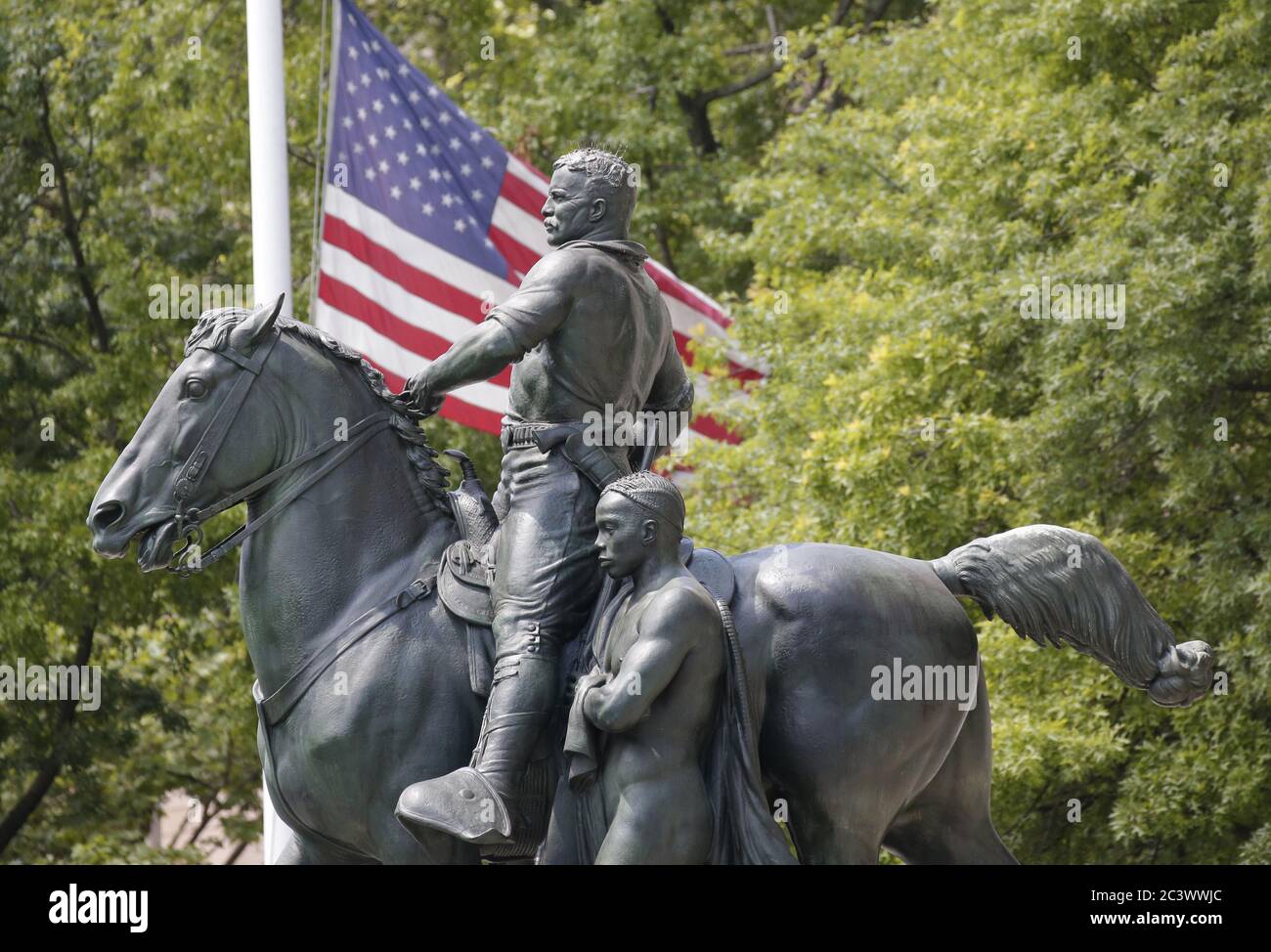 Police barricades surround the area around a bronze statue of former ...
