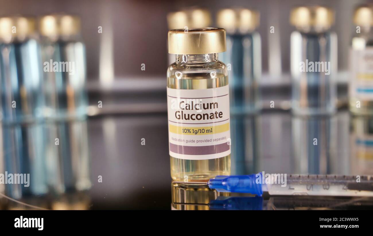 Vial of Calcium Gluconate stainless steel background Stock Photo - Alamy