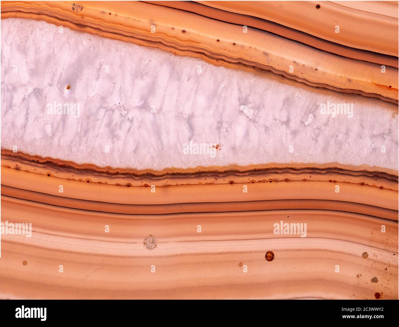 Backlighted sliced agate rock with crystals and layers Stock Photo - Alamy