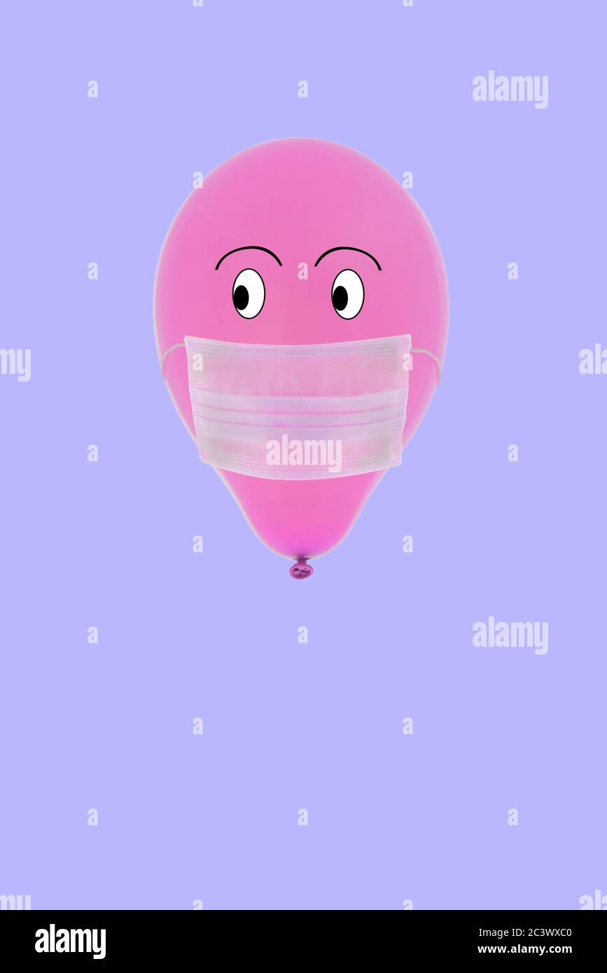 Colored balloon-emoticon with surgical mask Stock Photo - Alamy