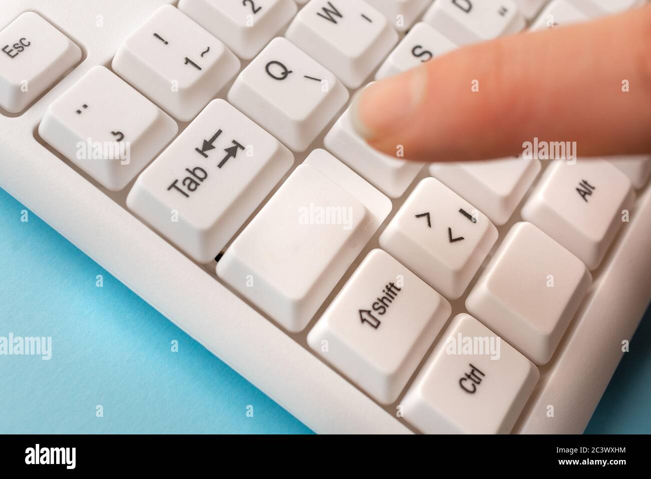 Pc keyboard key with pointing finger above background copy space Stock ...