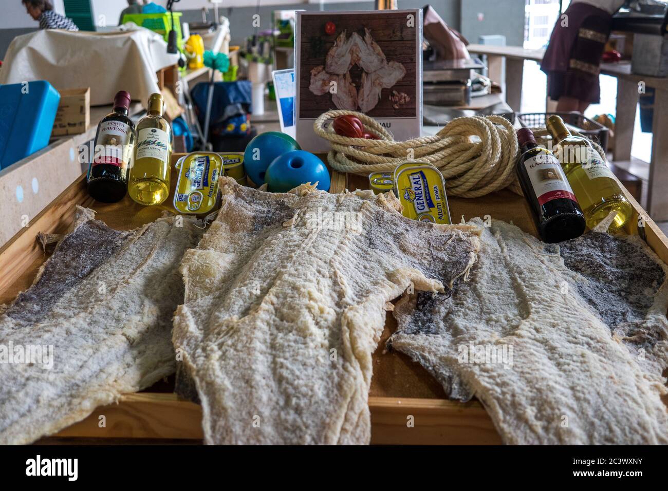 Display of Portuguese salted cod, bacalhau or bacalao, wine and canned ...