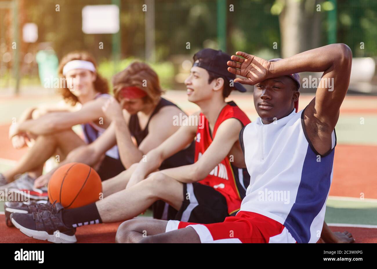 Tired man playing basketball hi-res stock photography and images - Alamy