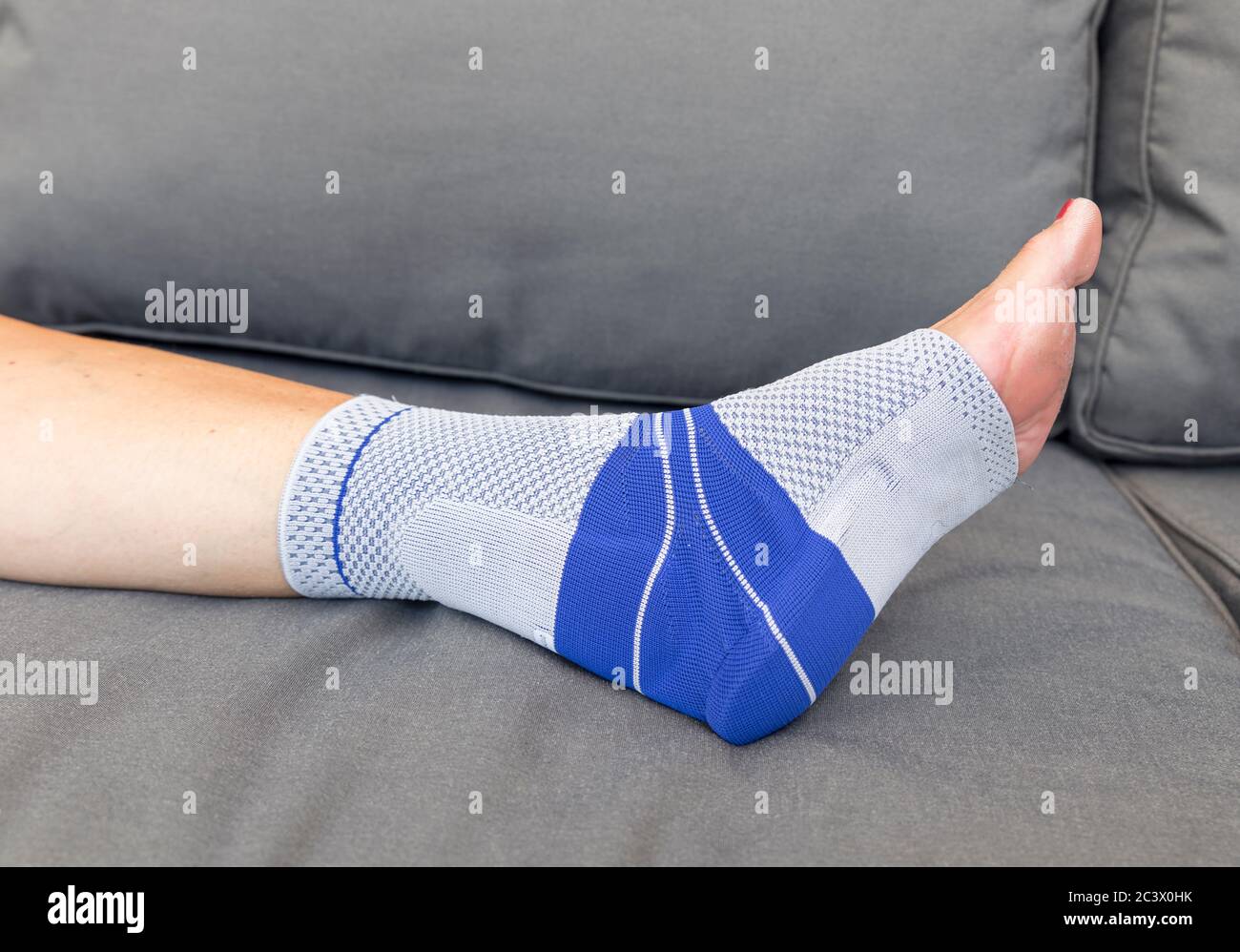 Leg in a a heel brace to prevent haglundse and protect the Achilles ...