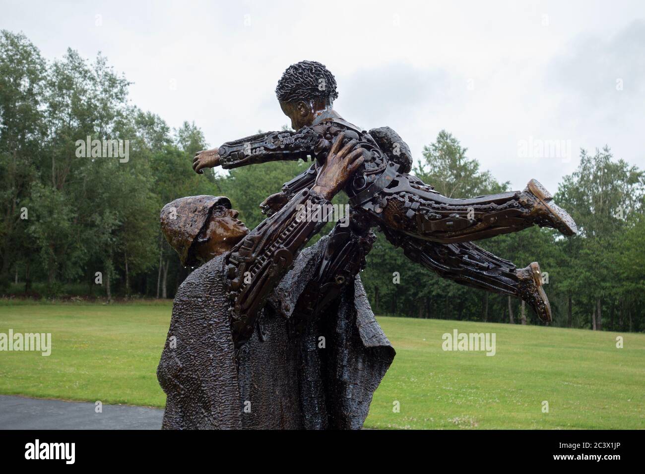 The memorial statue to workers who died, st.helens, merseyside ...