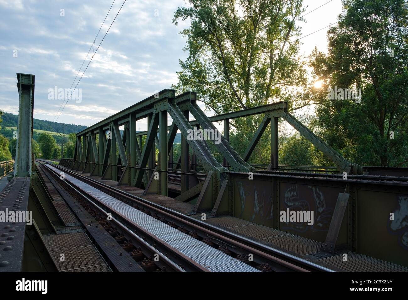 Old railway bridge with steel structure and steel girders in the ...