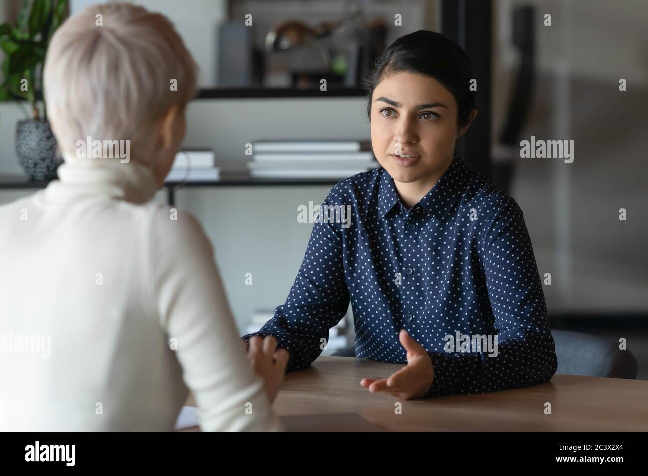 Indian applicant and caucasian HR manager communication during job ...