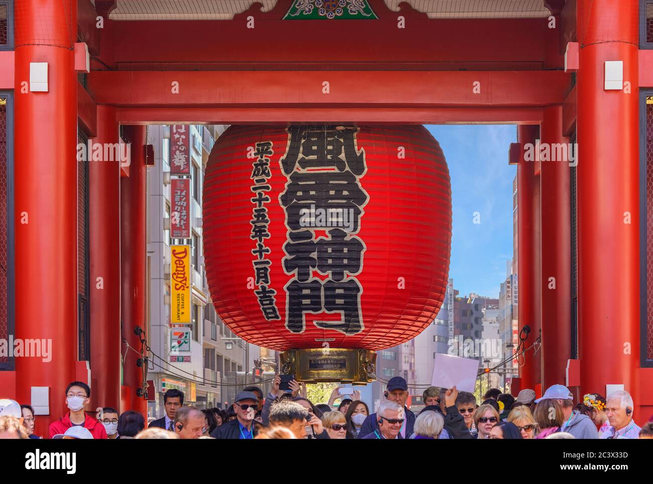 tokyo, japan - april 04 2020: Red wooden pillars of the Kaminarimon or ...