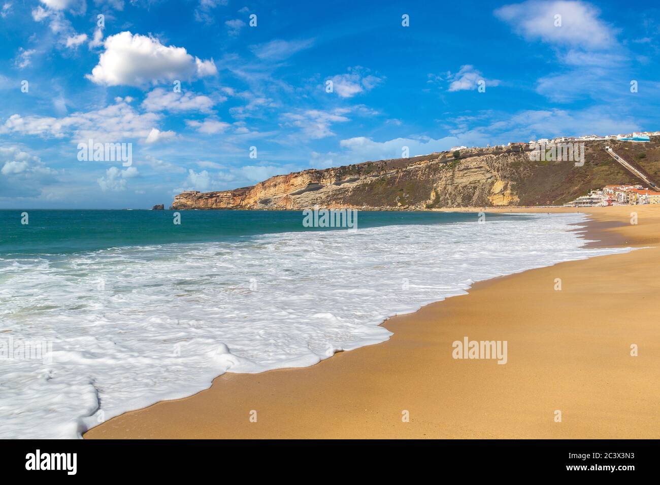 Nazare coast and sandy beach, atlantic ocean, Portugal in a beautiful ...