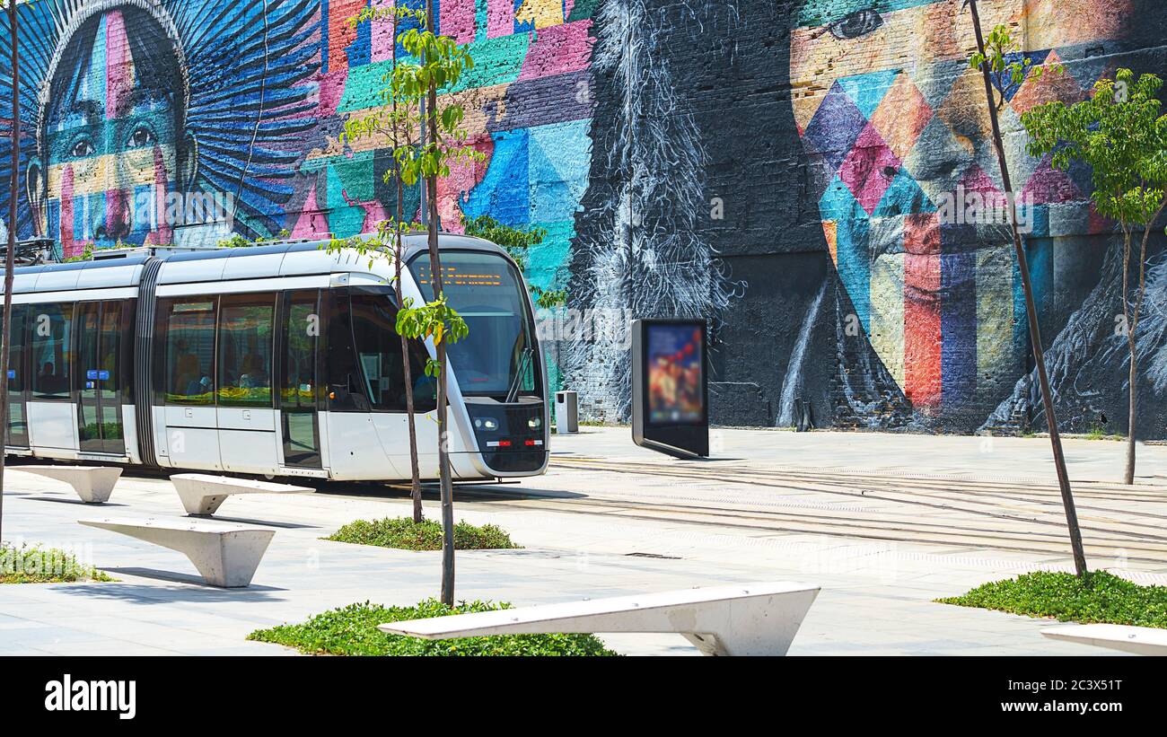 Light rail vehicles that runs through the Center and the Port of the ...