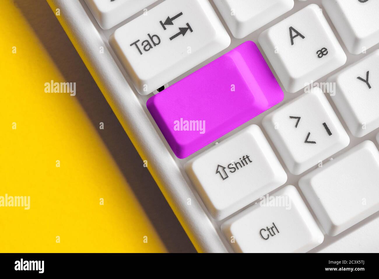 Different Colored Keyboard key With Accessories Arranged On Empty copy ...