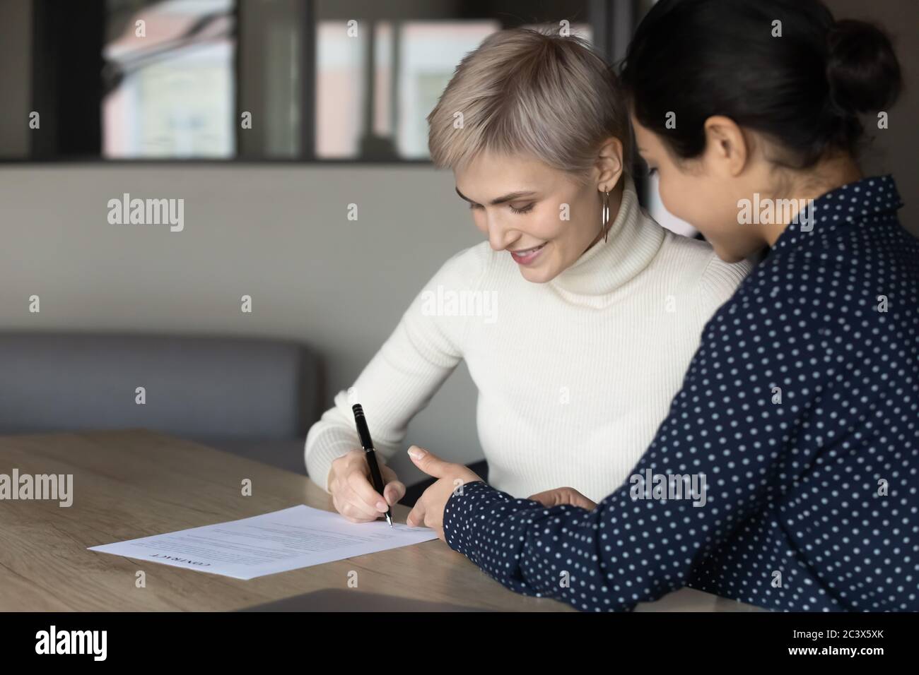 Applicant sign hiring agreement after successful job interview pass ...