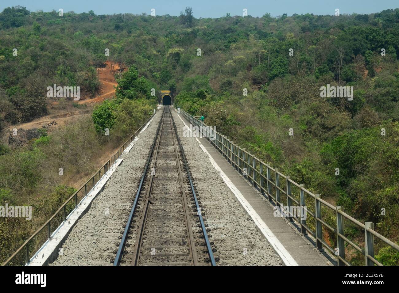 Train tracks of Mumbai to Goa line, India Stock Photo - Alamy
