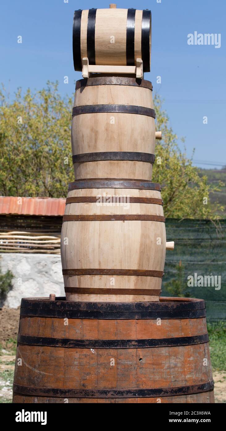 Wooden big barrels. Stand on top of each other Stock Photo - Alamy