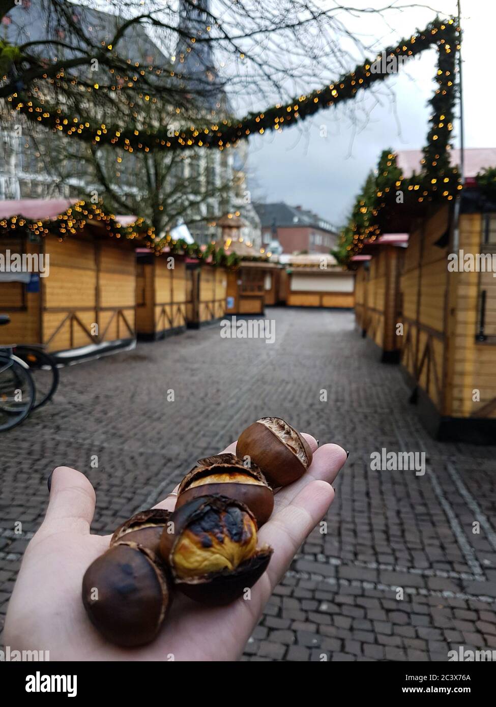Close up view of a handful of traditional treat -a roasted chestnuts ...