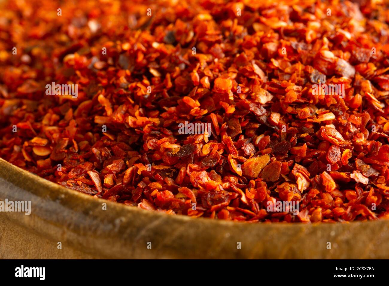 Spices: Dried ground red pepper in bowl Stock Photo - Alamy