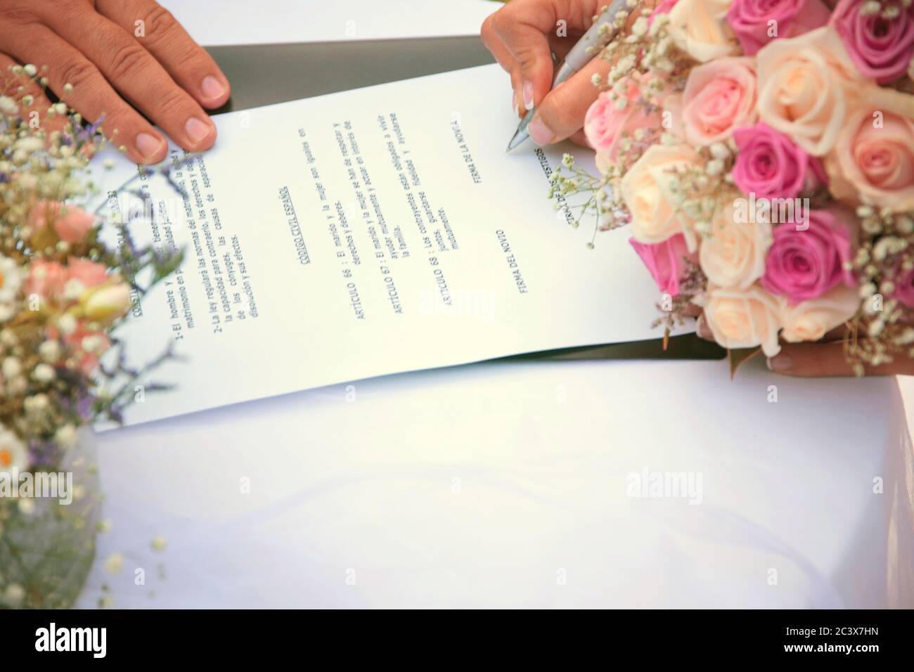 signing wedding documents flowers Stock Photo - Alamy