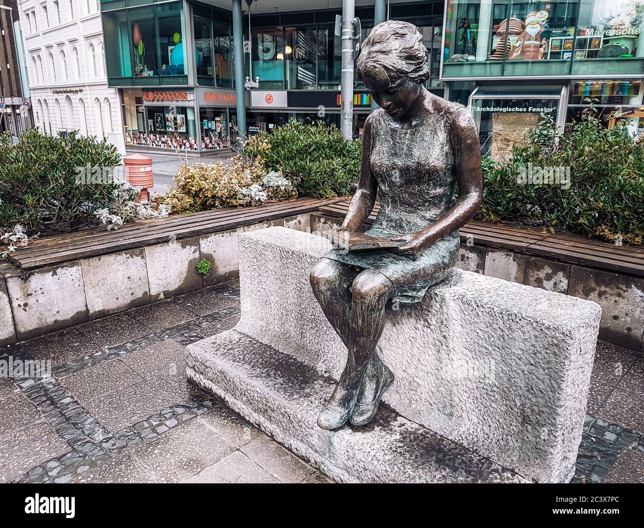 Aachen / Germany - January 2018: Bronze statue of a young girl reading ...
