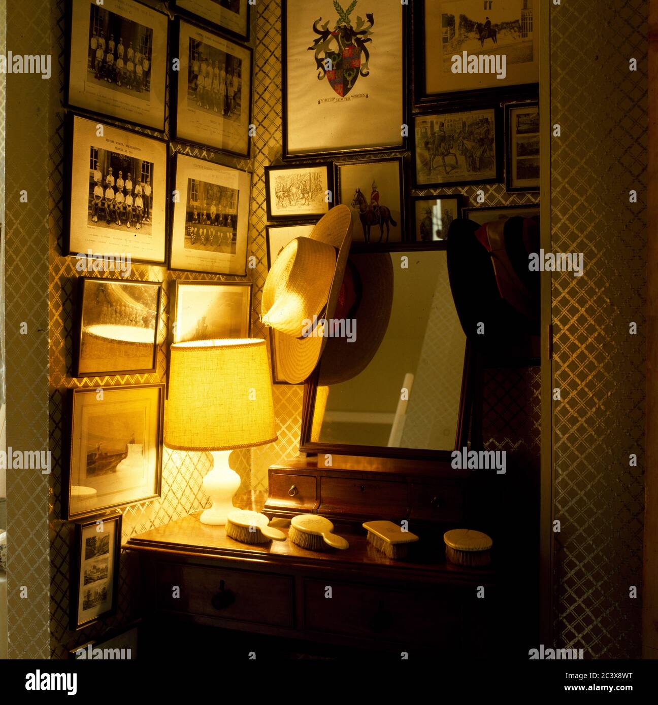 Closeup of gentleman's dressing table with lamp and photographs Stock ...