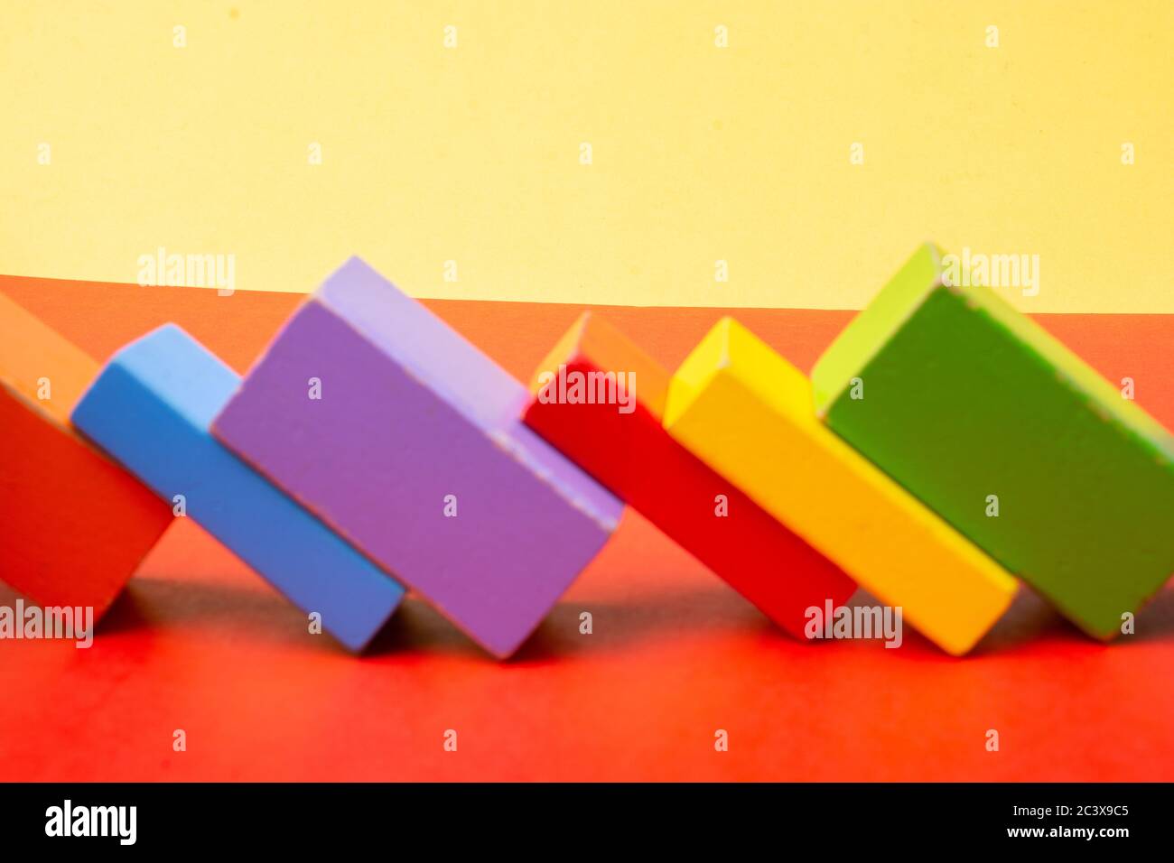 Different color and shape wooden toy building blocks Stock Photo - Alamy