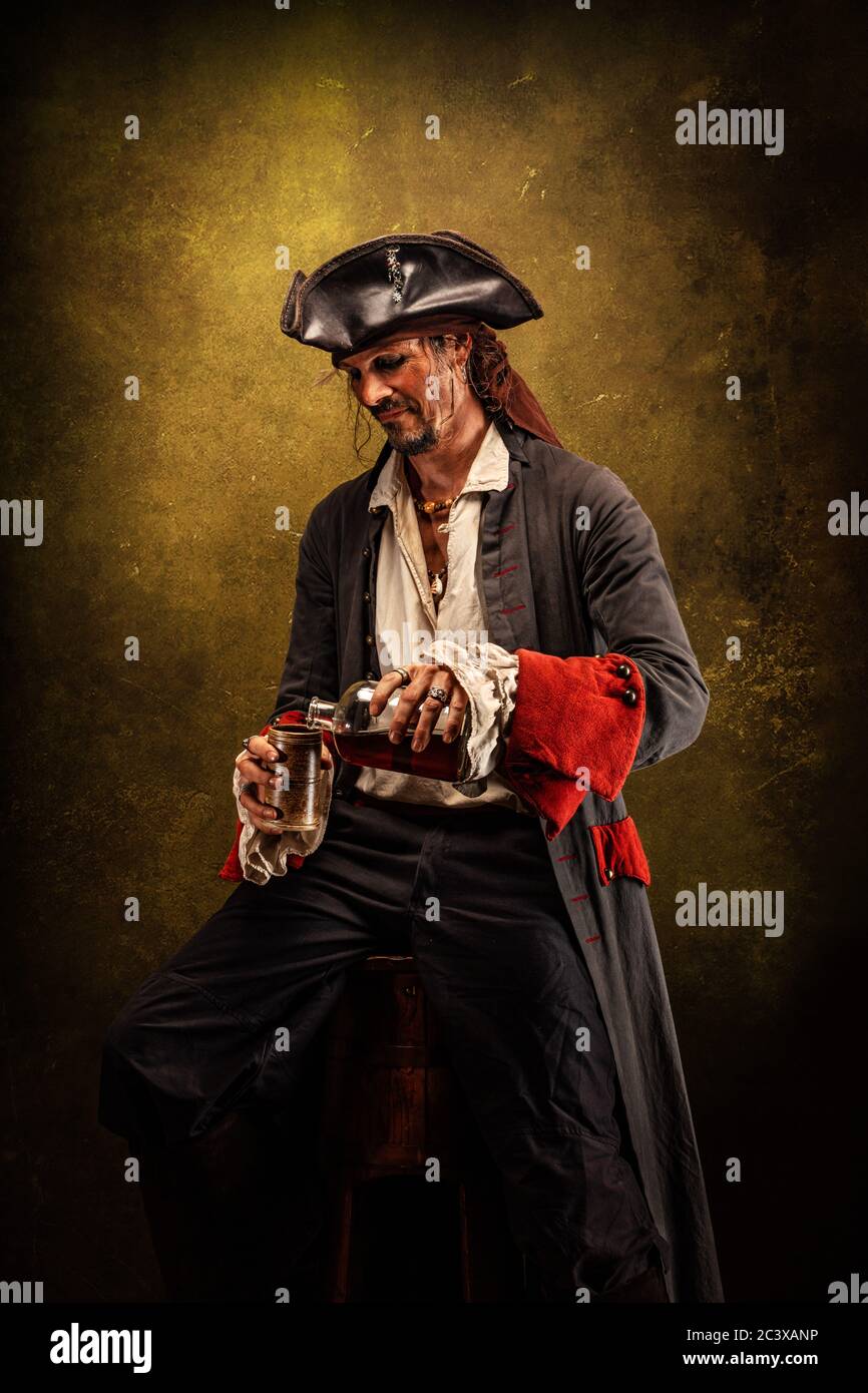 Portrait of a pirate in profile, drinking rum sitting in a tavern Stock ...