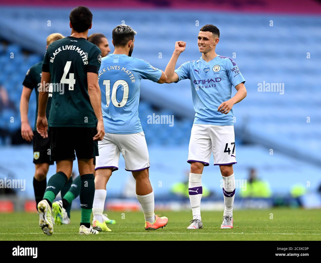 Manchester City's Phil Foden celebrates scoring his side's first goal ...