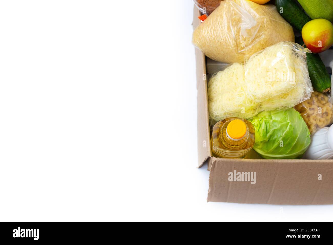 Food donations or food delivery concept in a cardboard box Stock Photo ...