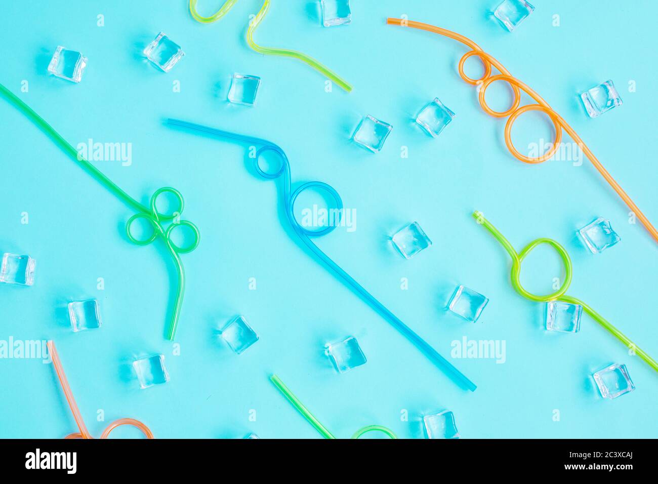 paper disposable straws for summer cocktails and ice cube Stock Photo ...