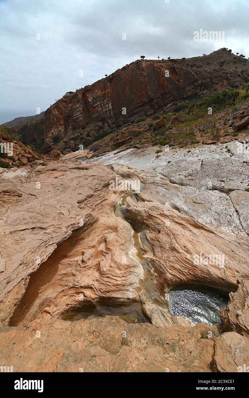 Socotra scenery, Yemen. Mountain landscape, riverbed on foreground ...