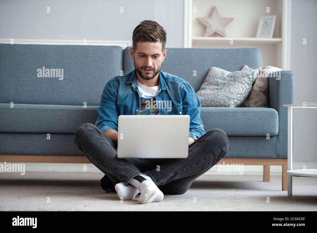 Handsome modern man designer hi-res stock photography and images - Alamy