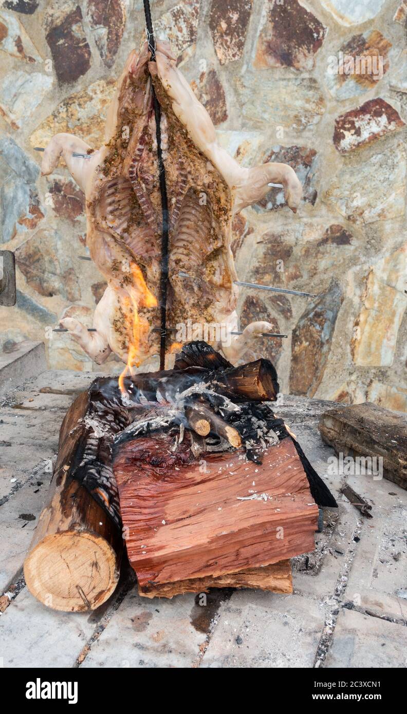 Pig cooking over open fire hi-res stock photography and images - Alamy