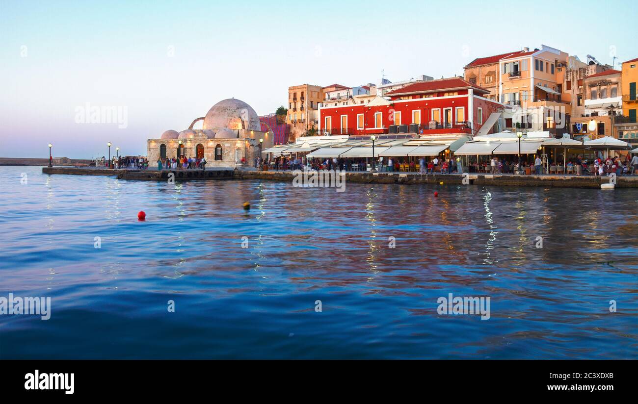 venetian habour and Turkish Mosque Yiali Tzami of Chania Stock Photo ...