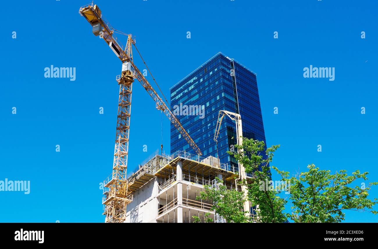 The construction of a modern skyscraper in the city center Stock Photo ...